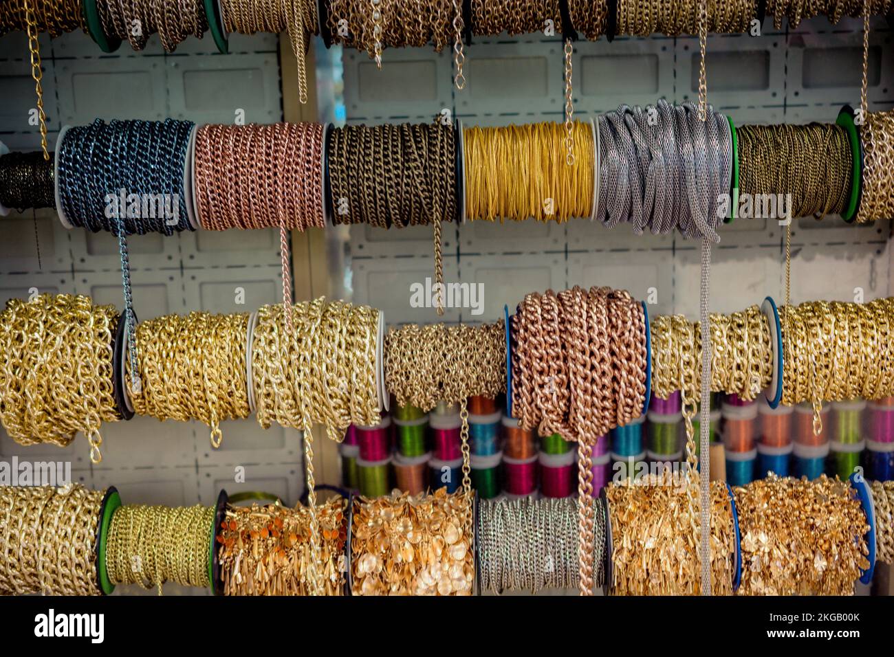 Rolls of metal chains as a background texture Stock Photo - Alamy