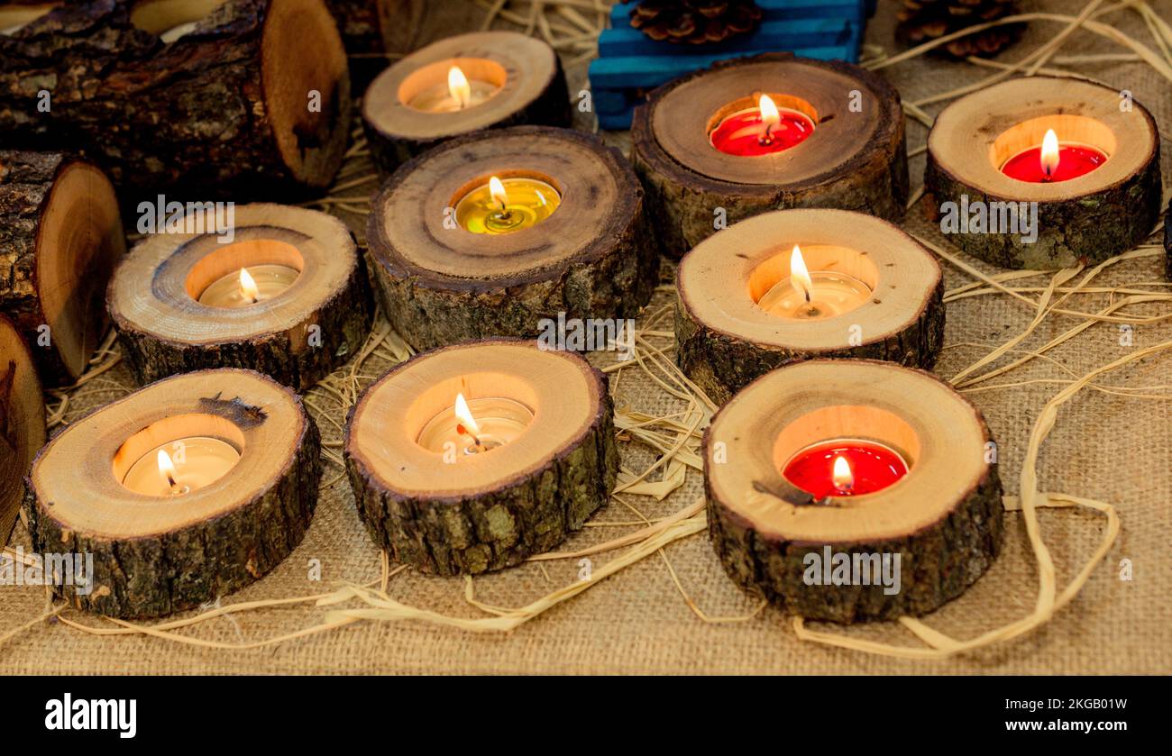 Burning candle making light in view Stock Photo - Alamy