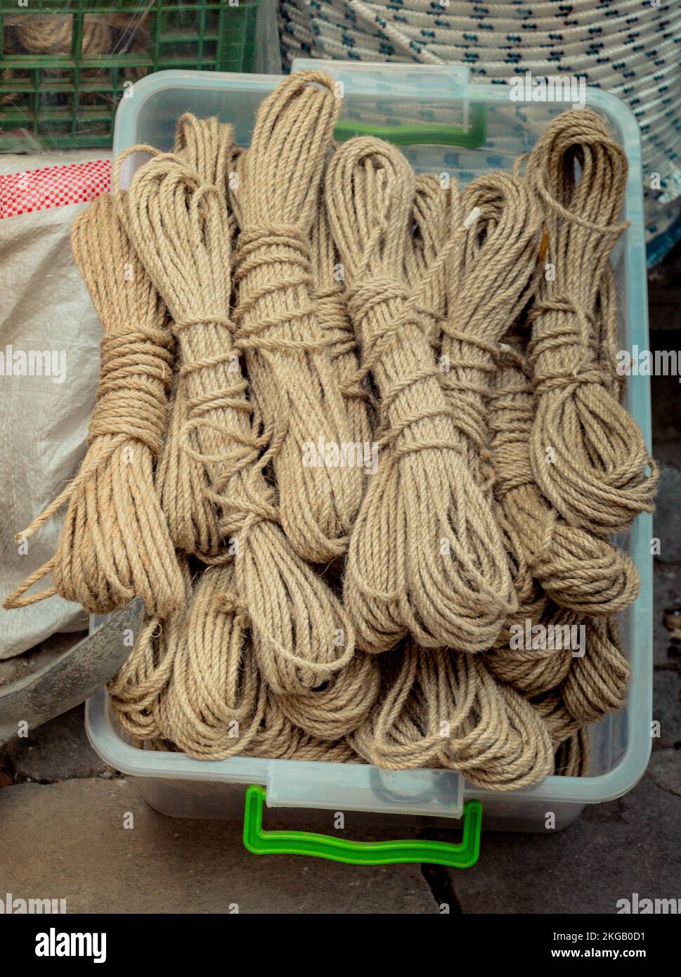 Bundle of linen rope in a market place Stock Photo - Alamy
