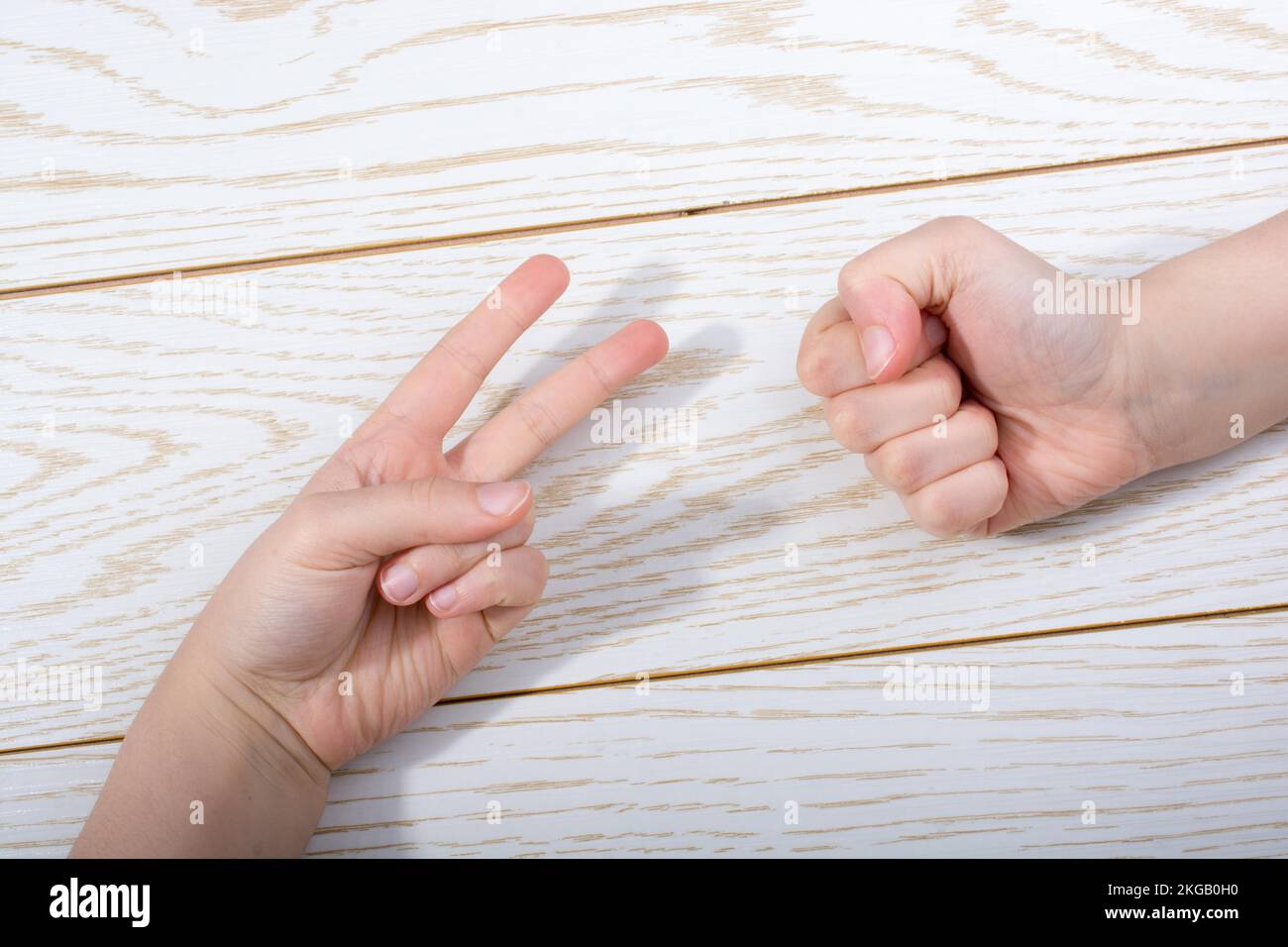 Hands rock paper scissors hi-res stock photography and images - Alamy