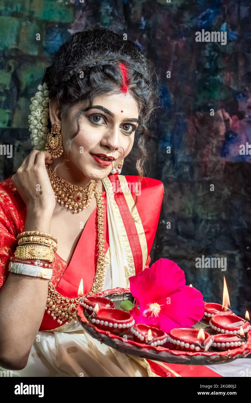 A beautiful woman playing sindur khela on the occasion of vijya dashmi ...