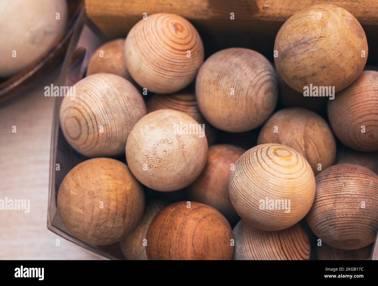 Plenty of wooden balls of light brown color Stock Photo - Alamy
