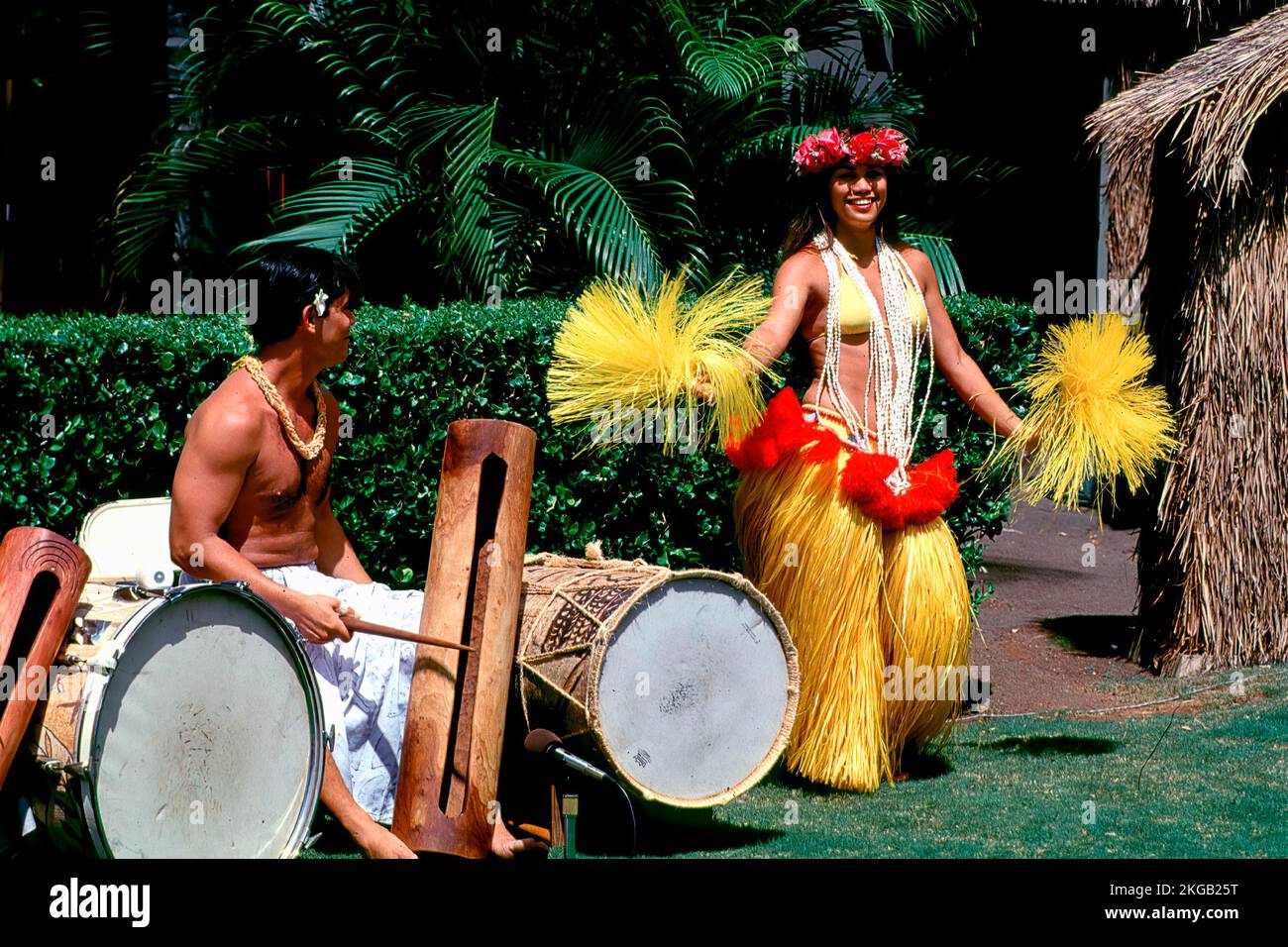 Dancer and drummer at historic Kodak Hula Show, Honolulu, Oahu, Hawaii ...