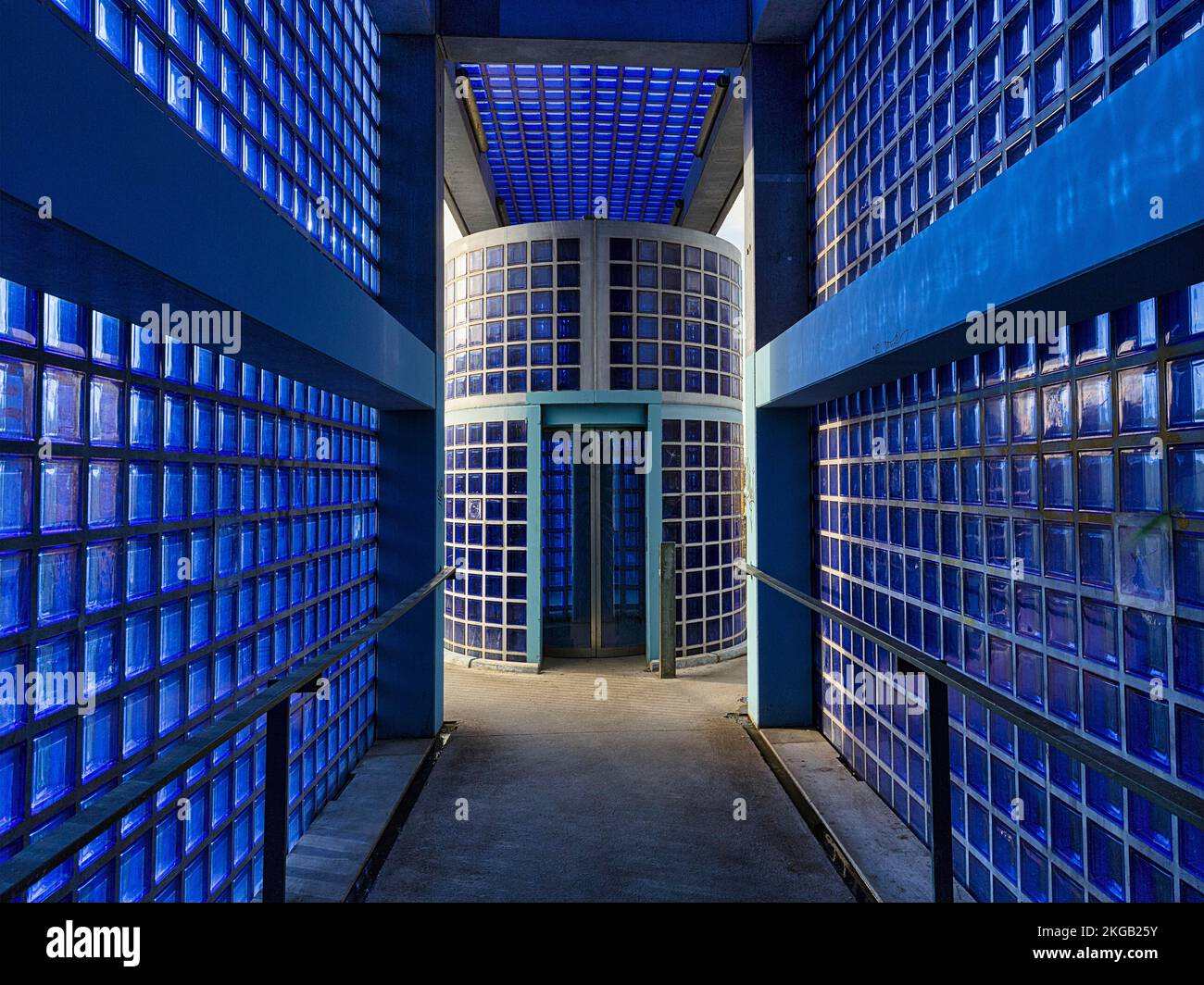 Access to the S-Bahn platform with lift made of blue glass blocks and ...