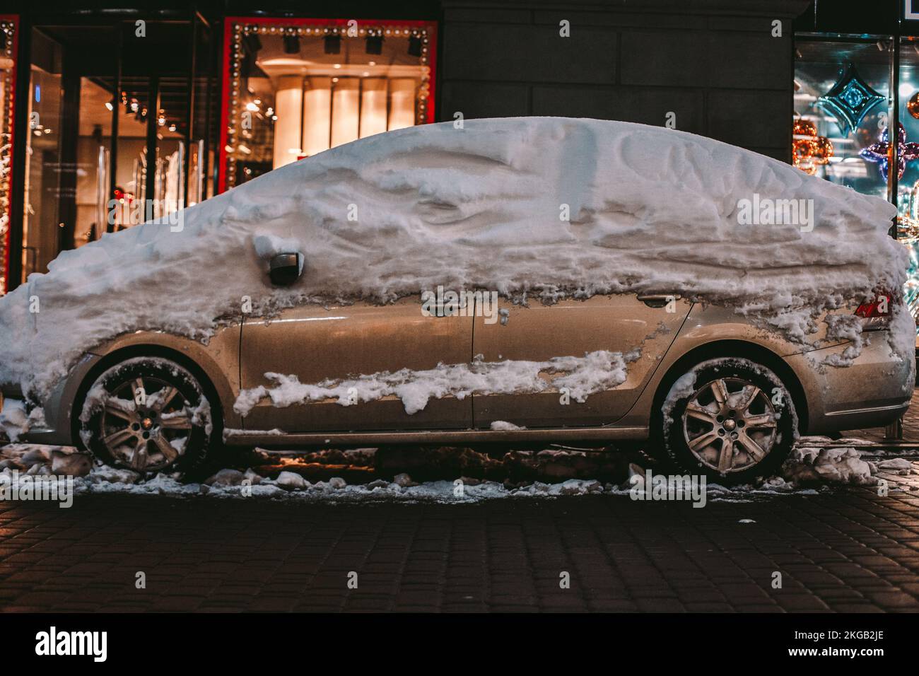 Car covered with snow Stock Photo - Alamy