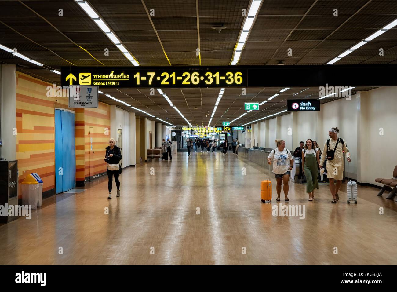 Bangkok, Thailand. 23rd Nov, 2022. Passengers walk through the ...
