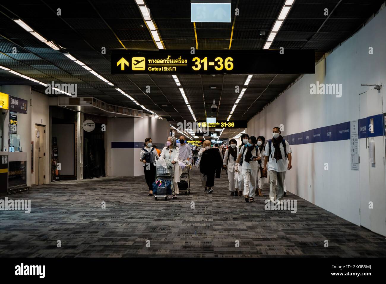 Passengers walk through the international departures terminal at Don ...