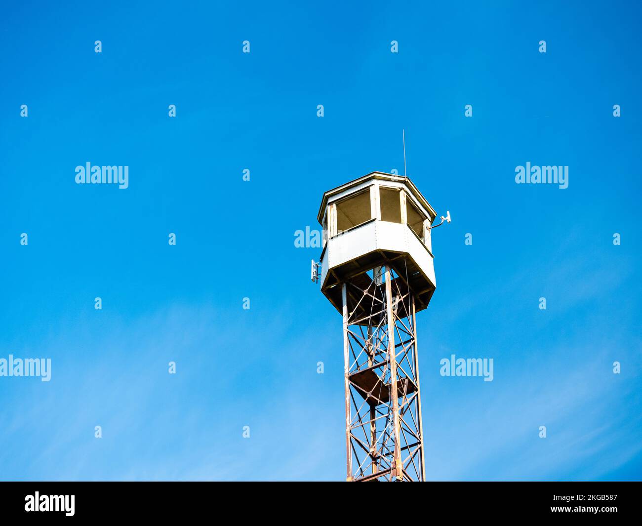 Old observation tower against the blue sky Stock Photo - Alamy