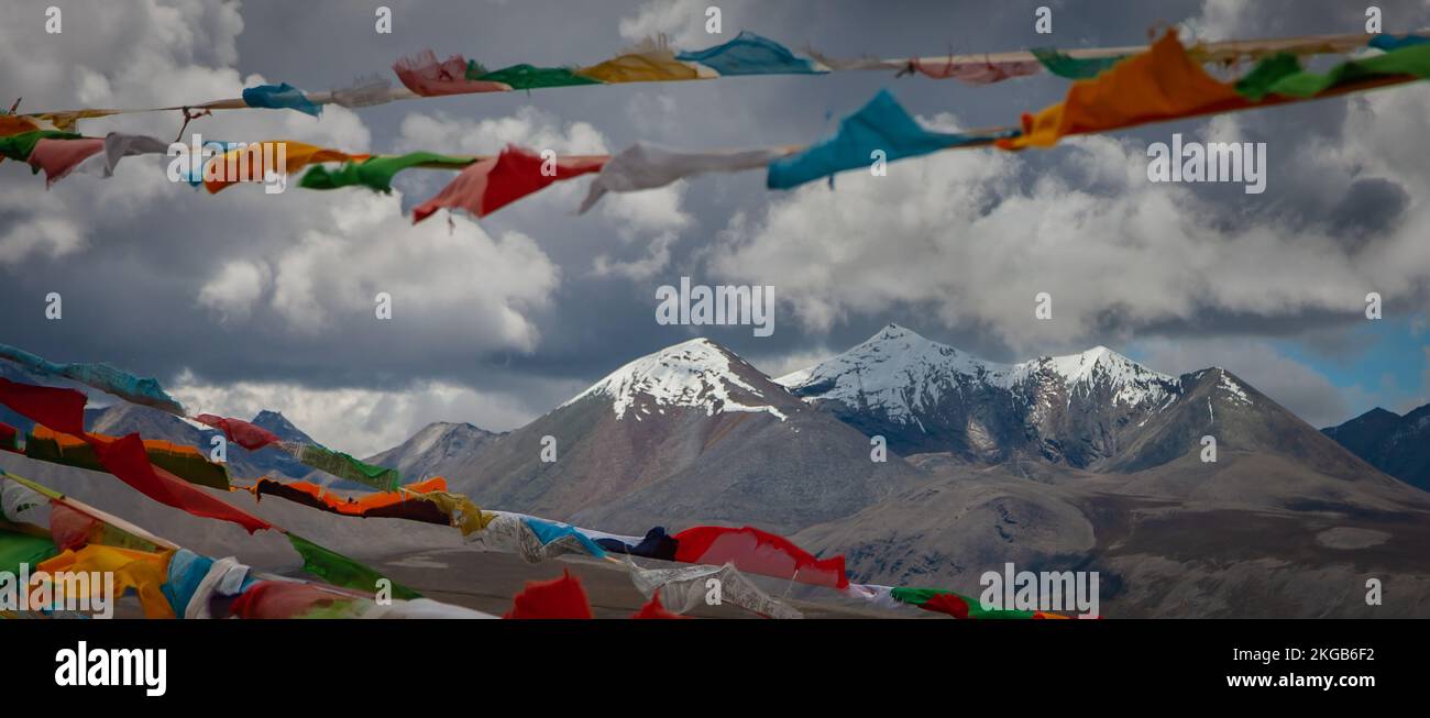 Prayer flags over the Himalayas, Tibet Stock Photo - Alamy