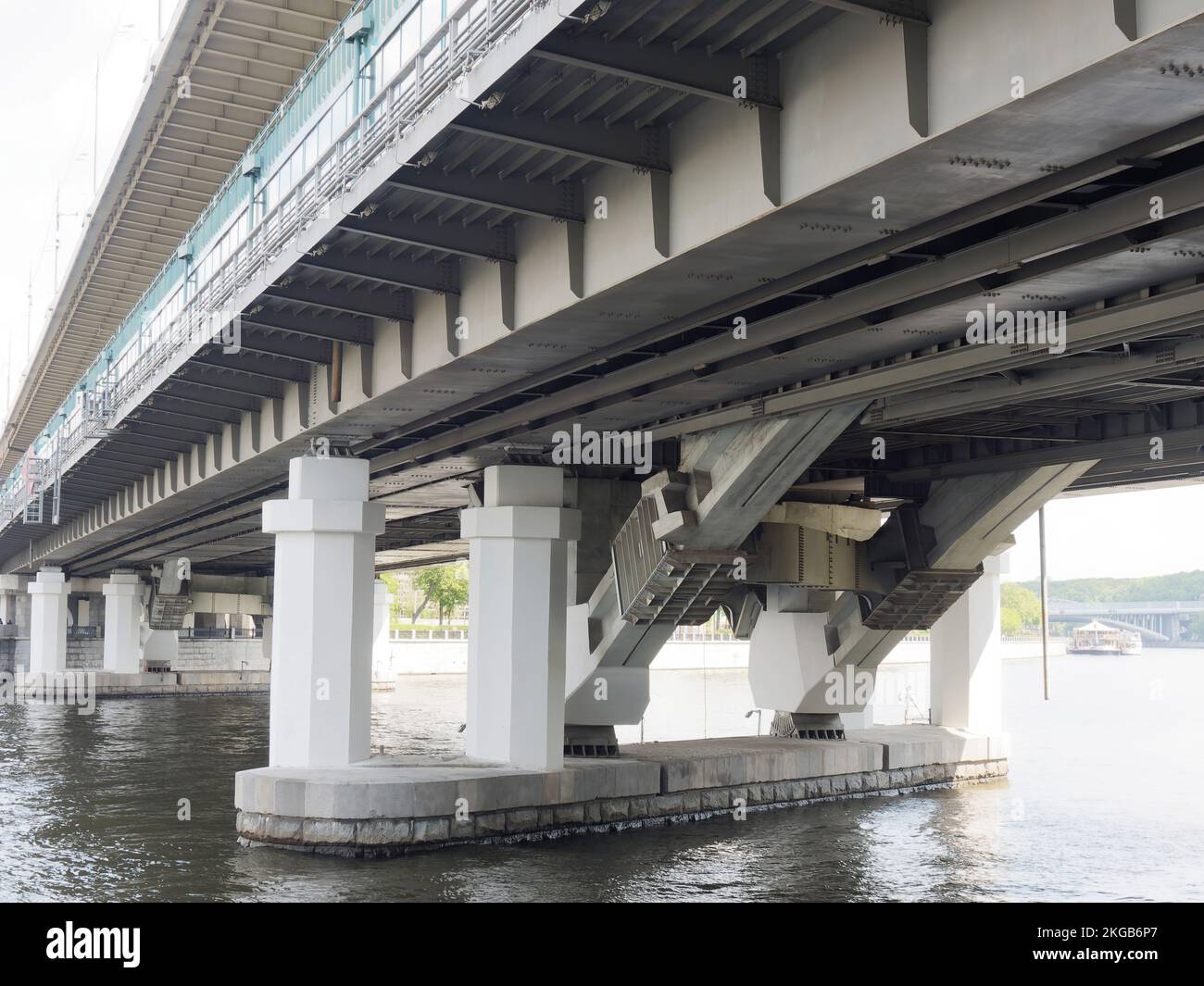 Subway railway bridge across the river with concrete piers Stock Photo ...