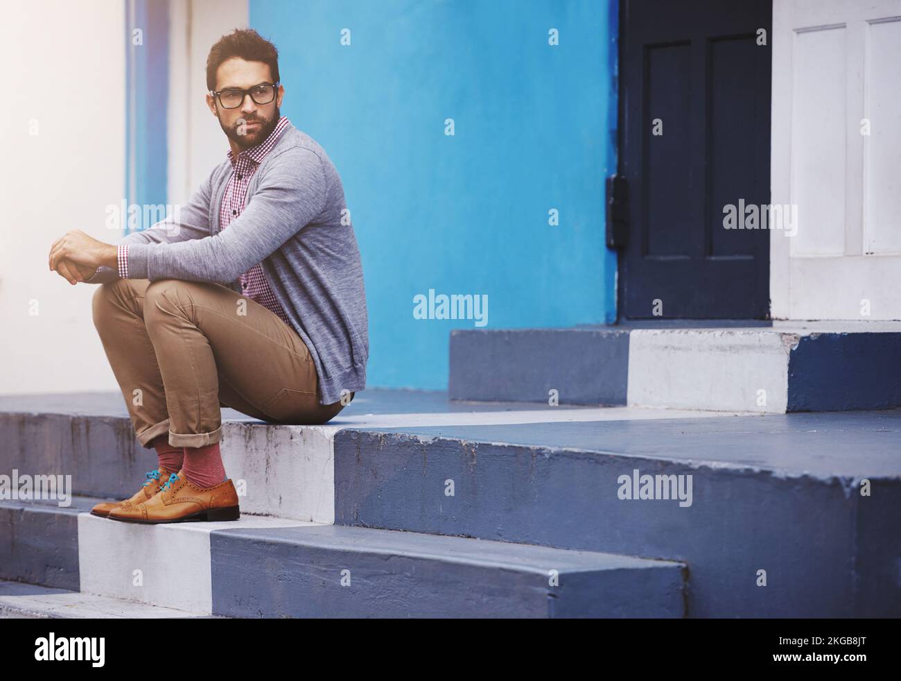 Taking the steps toward style. Full length shot of a stylish man ...