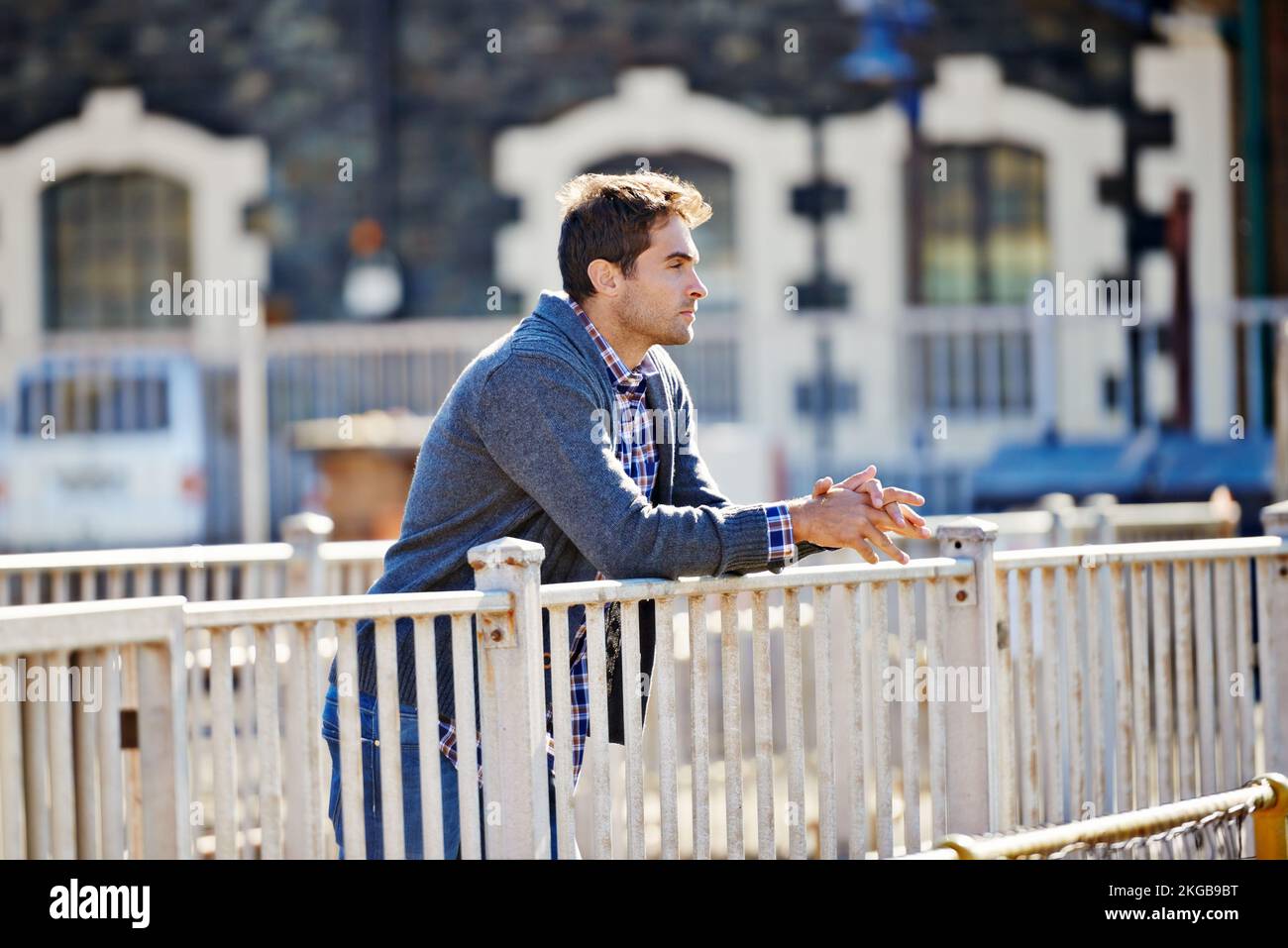 Man leaning on railing hi-res stock photography and images - Alamy