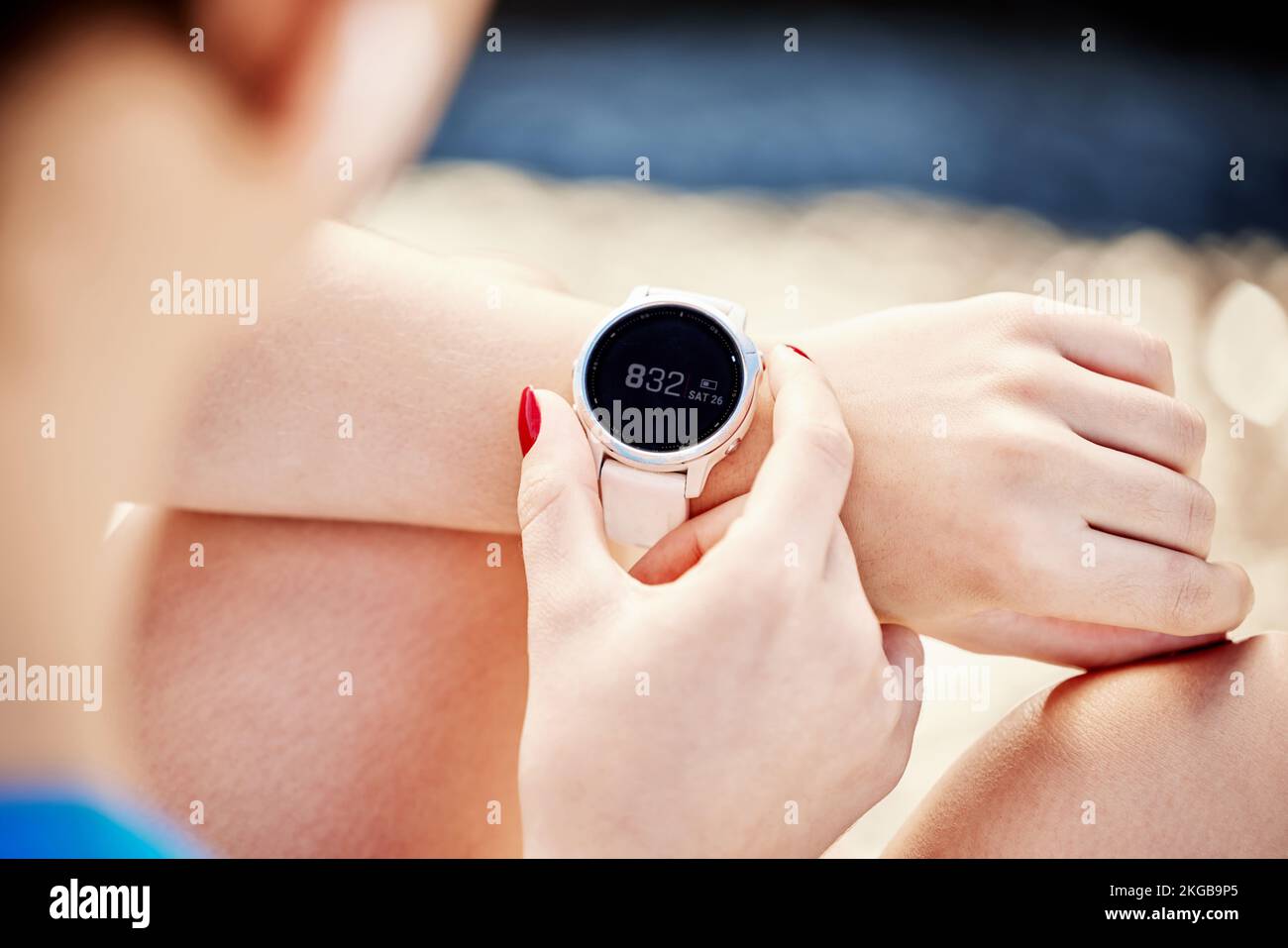 Watch, time and exercise with a sports woman tracking her workout ...