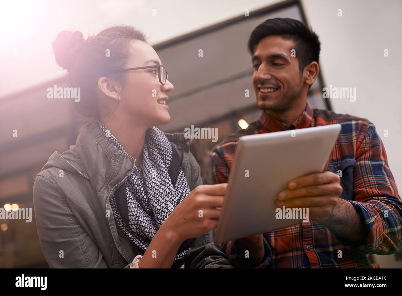 Diverse young adults tablet hi-res stock photography and images - Alamy