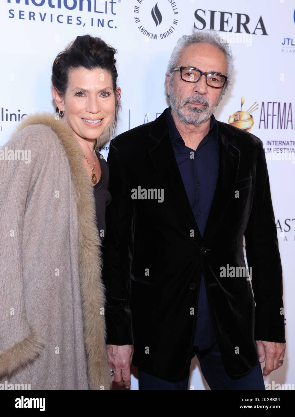 Beverly Hills, California, USA. 20th November, 2022. A guest and Arthur ...