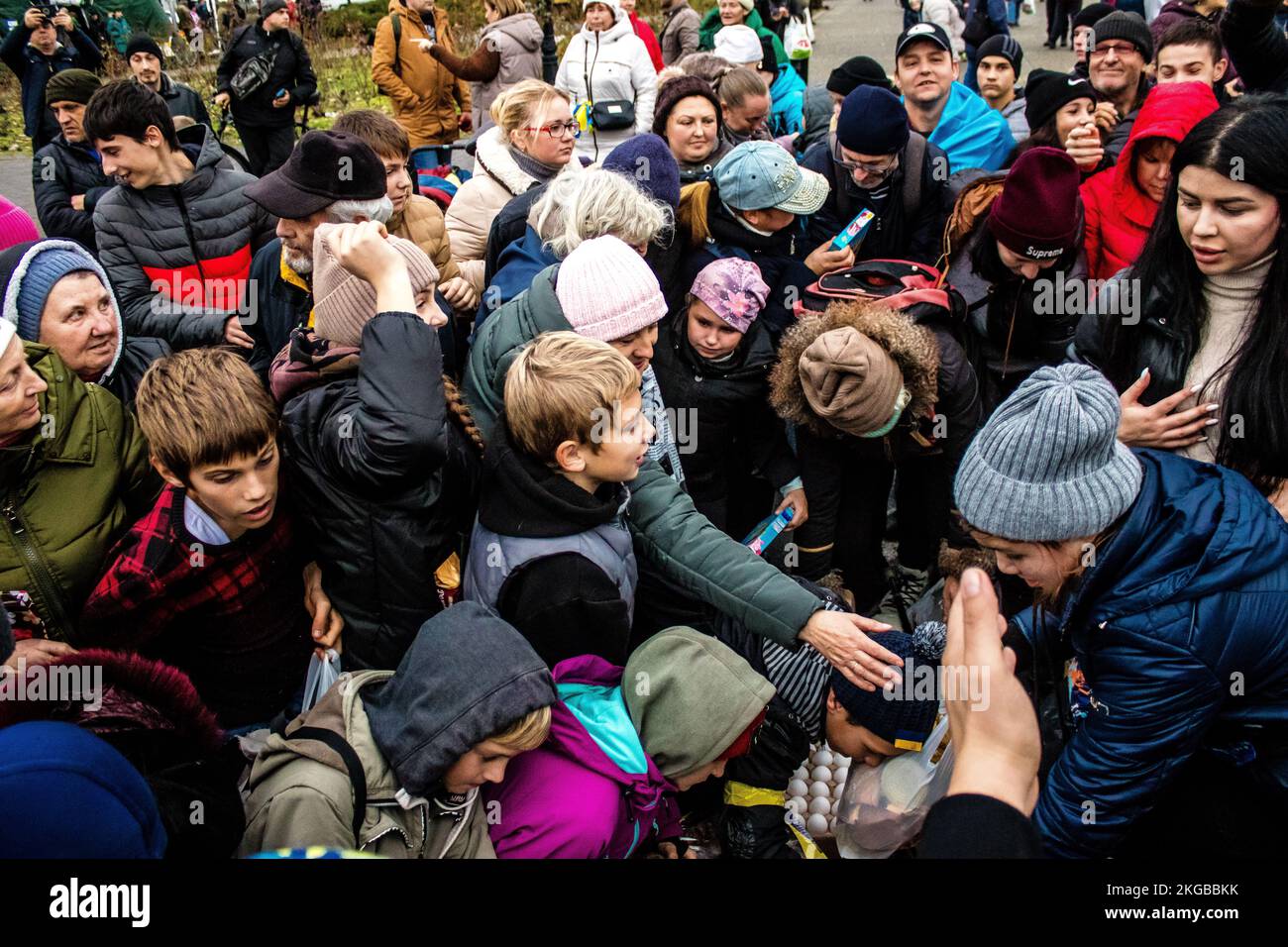 Residents of Kherson, Ukraine, receive food supplies in Freedom Square. The tension is very ...