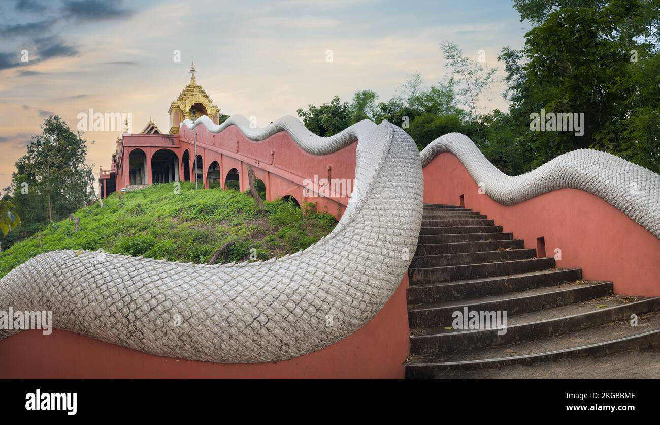 Stairs of beautiful temple Wat Doi Prachan Mae Tha at sunset. The holy ...