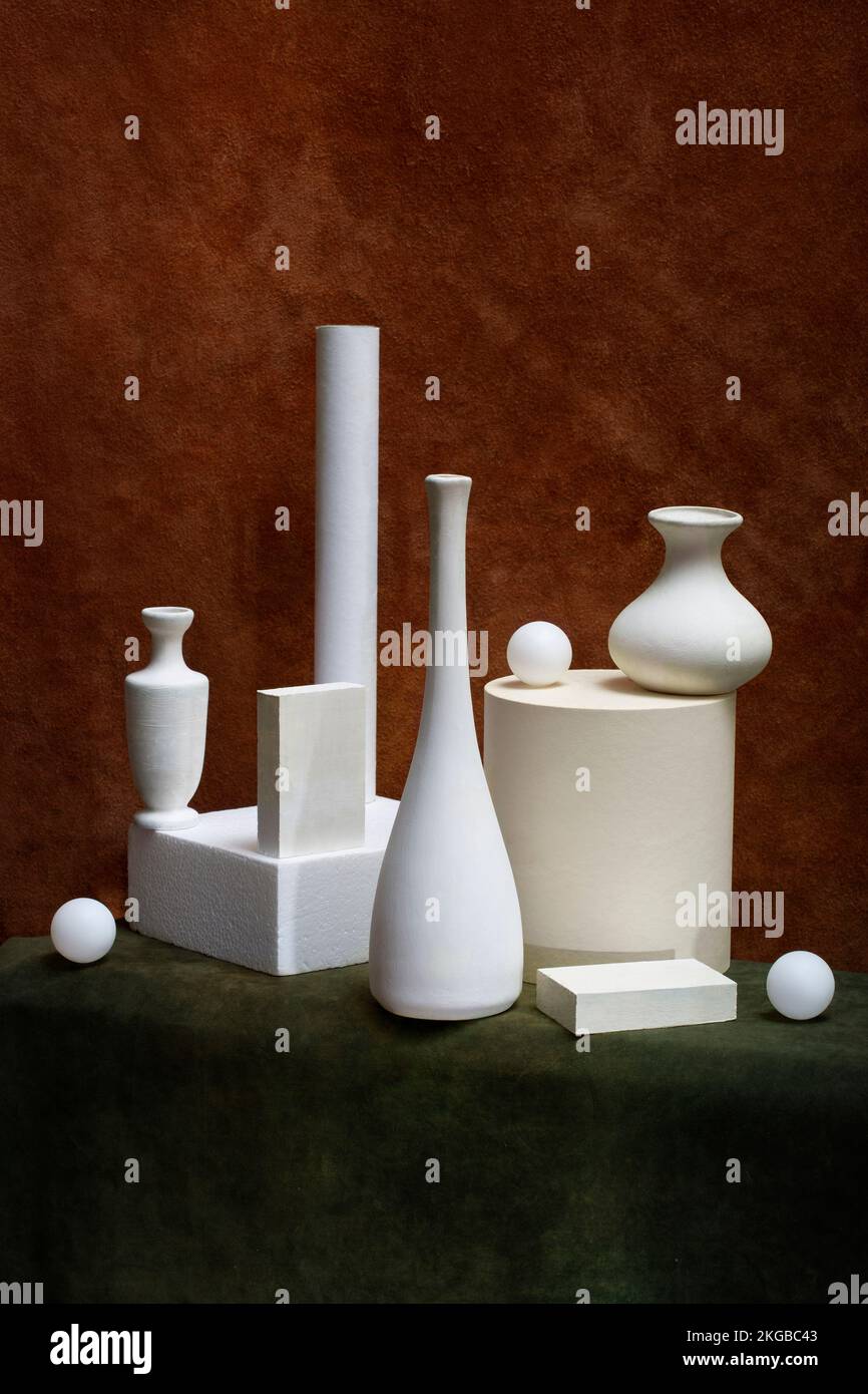 Still life with white vases and white figures Stock Photo - Alamy