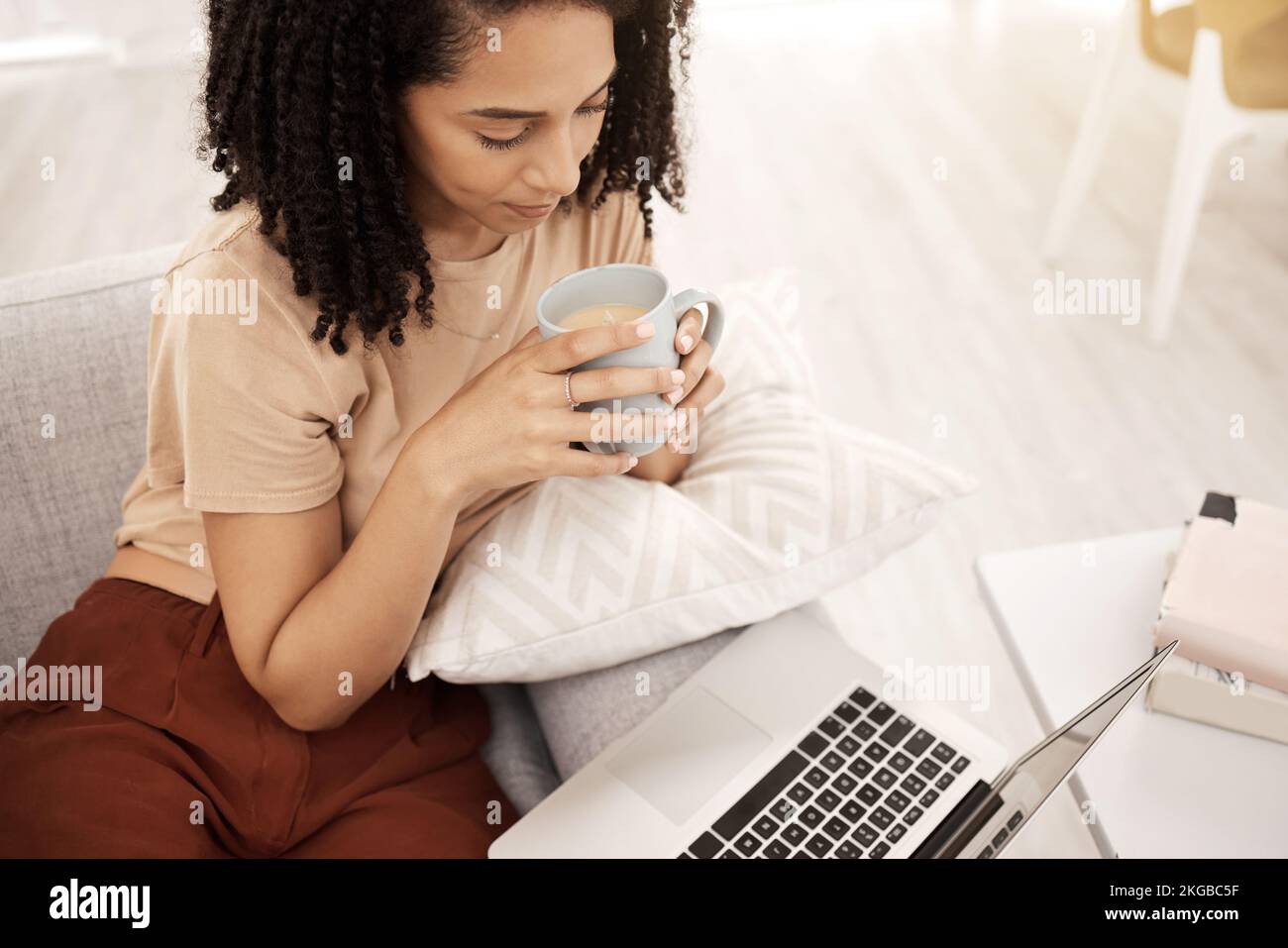 Relax, black woman and tea at laptop streaming app movie, series or ...