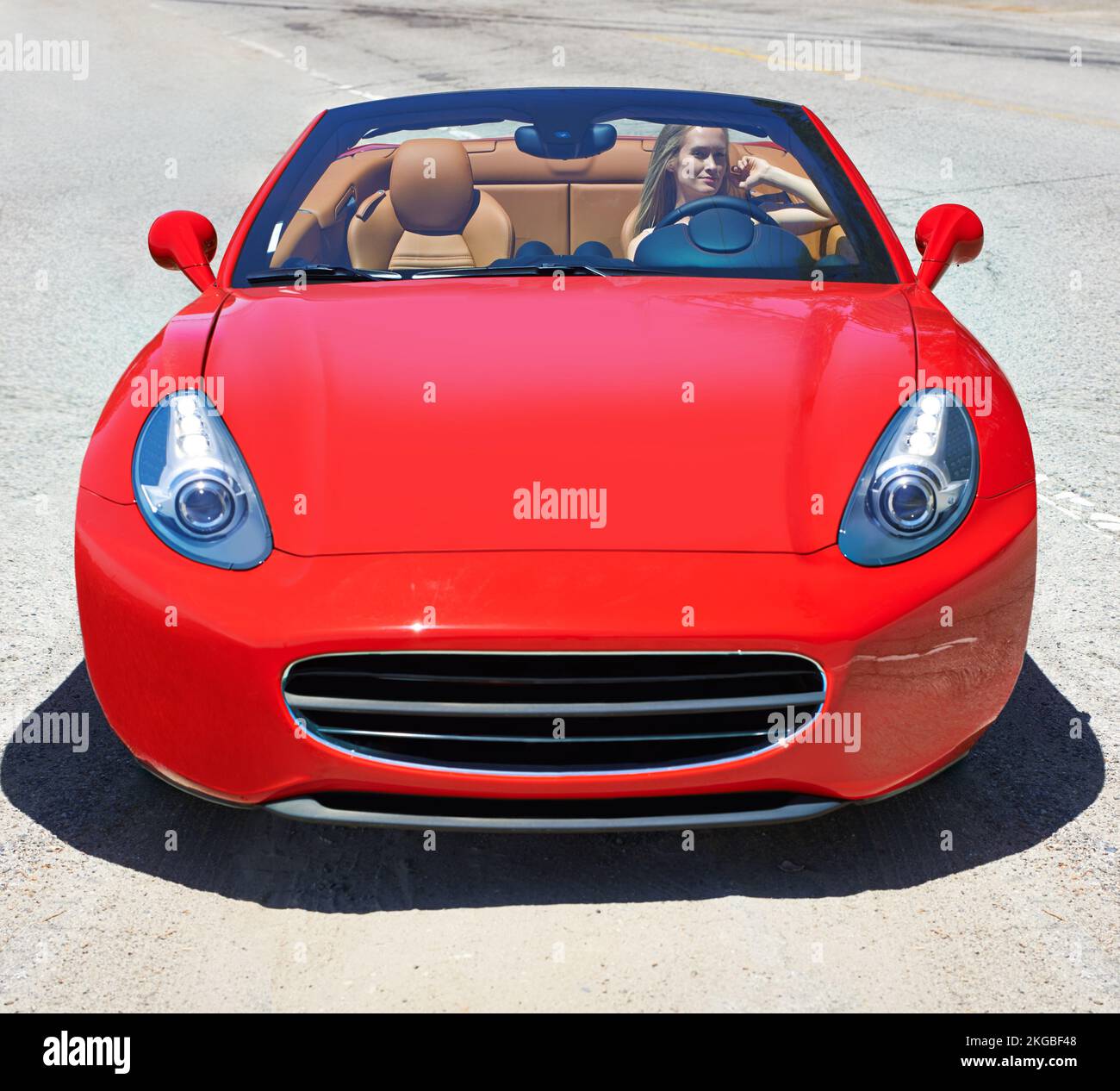 Lets get this baby on the road. a young woman driving in a sports car ...