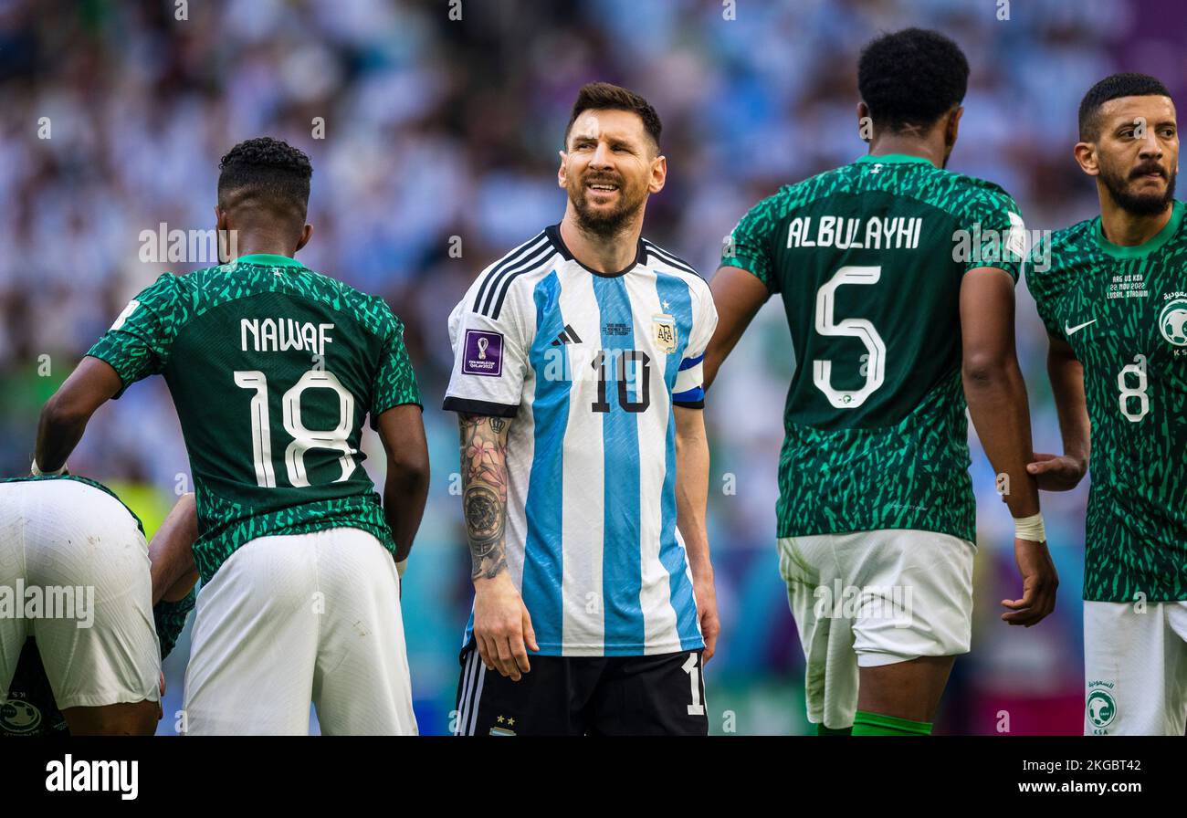 Doha, Qatar. 22nd Nov, 2022. Saleh Al-Shehri (Saudi), Nawaf Al-Abed (Saudi), Lionel Messi (Arg ...