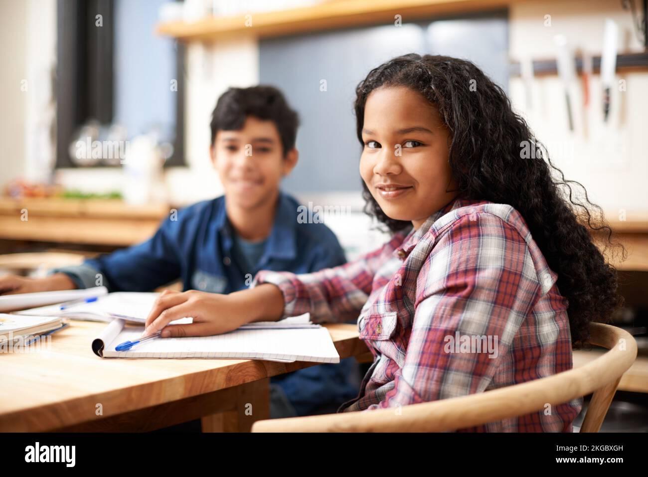 Who needs recess when theres homework to be done. two young students ...