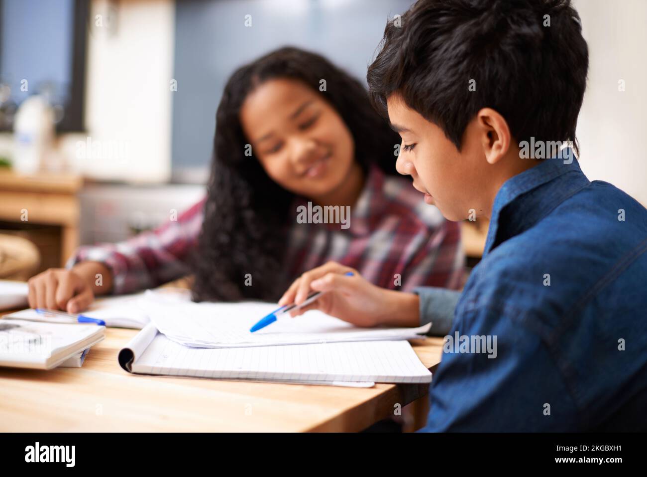 We are going to ace this project. two young students studying together ...