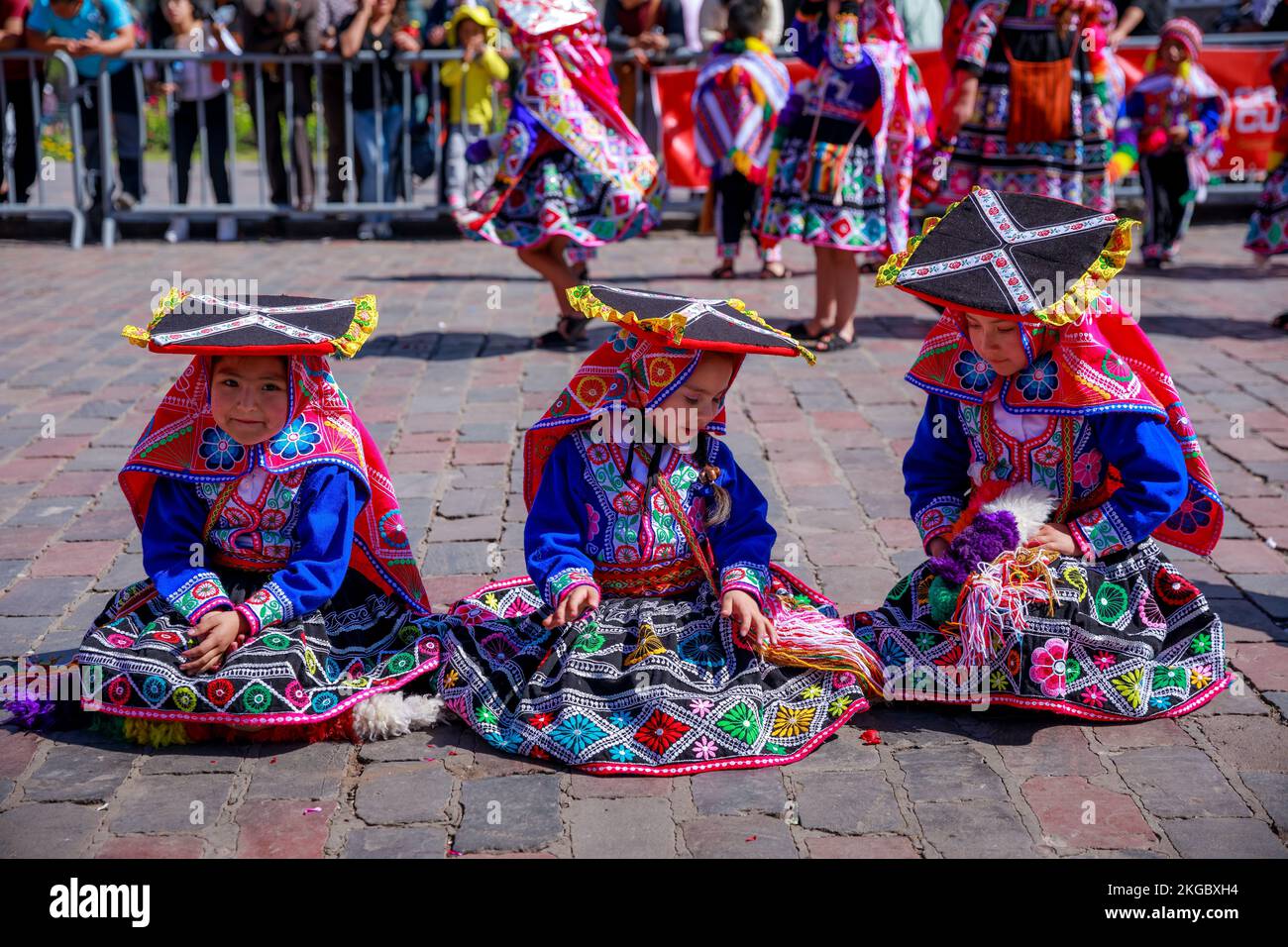 The Peruvian children in colorful traditional costumes during a ...