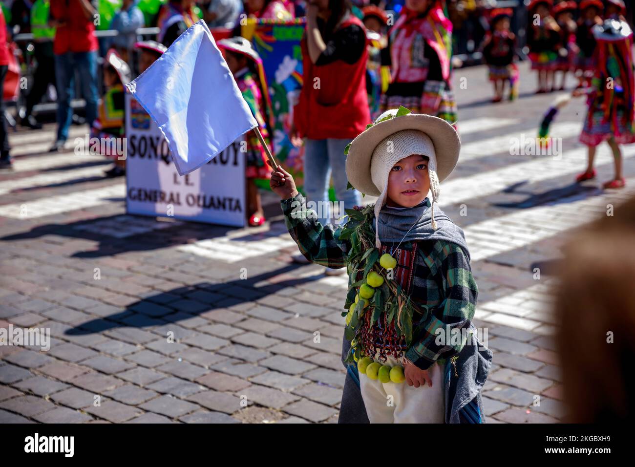 A colorfully dressed Peruvian child during a religious ceremony of Inti ...
