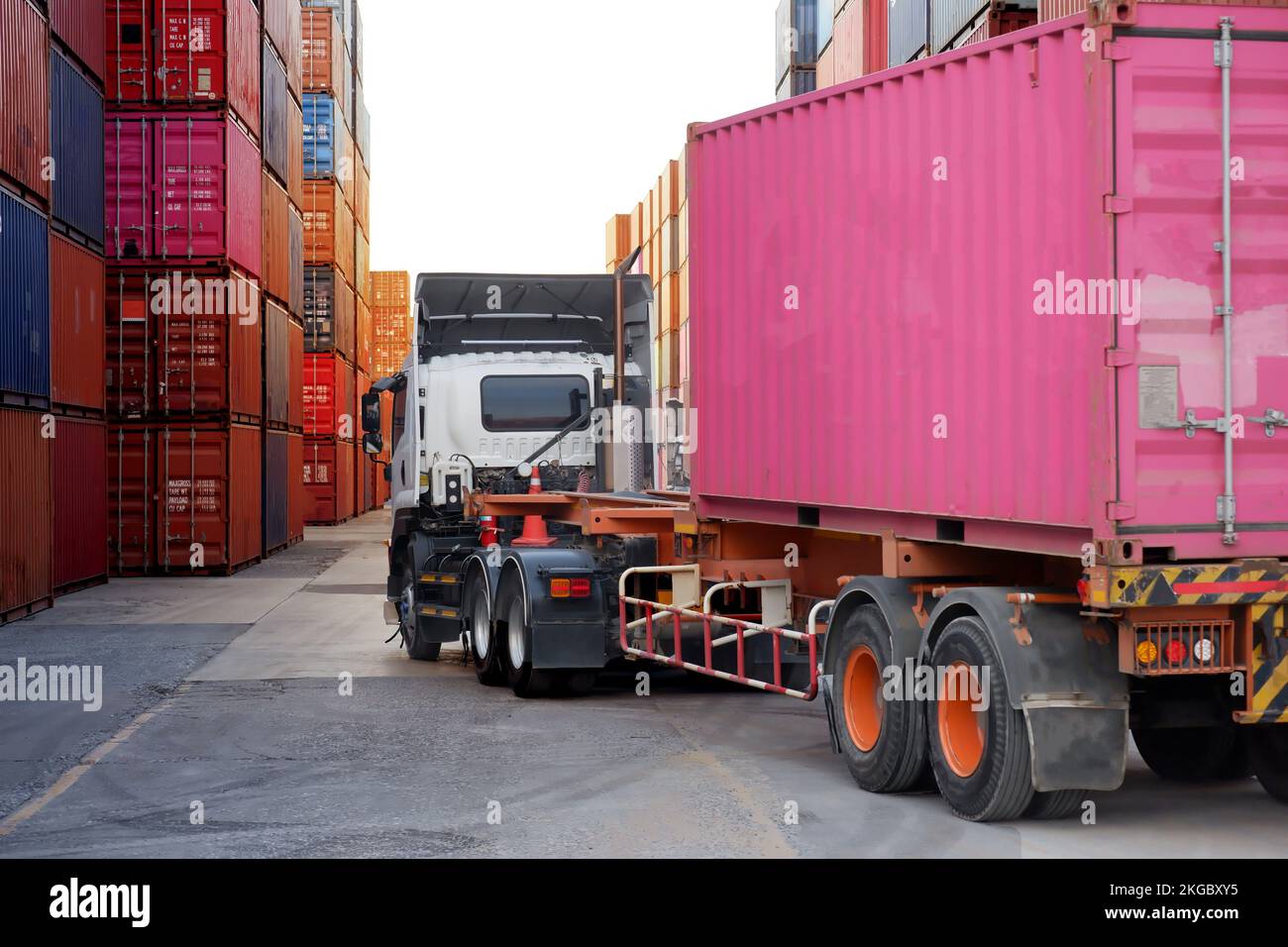 Truck logistics concept in container depot Stock Photo - Alamy