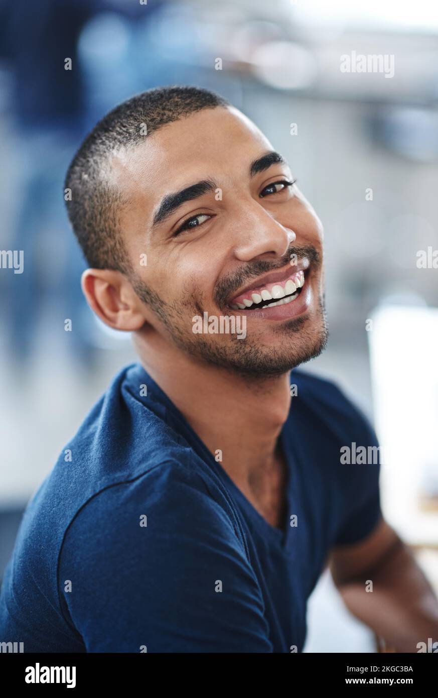 Make creativity a job. Portrait of a young designer at work on his ...