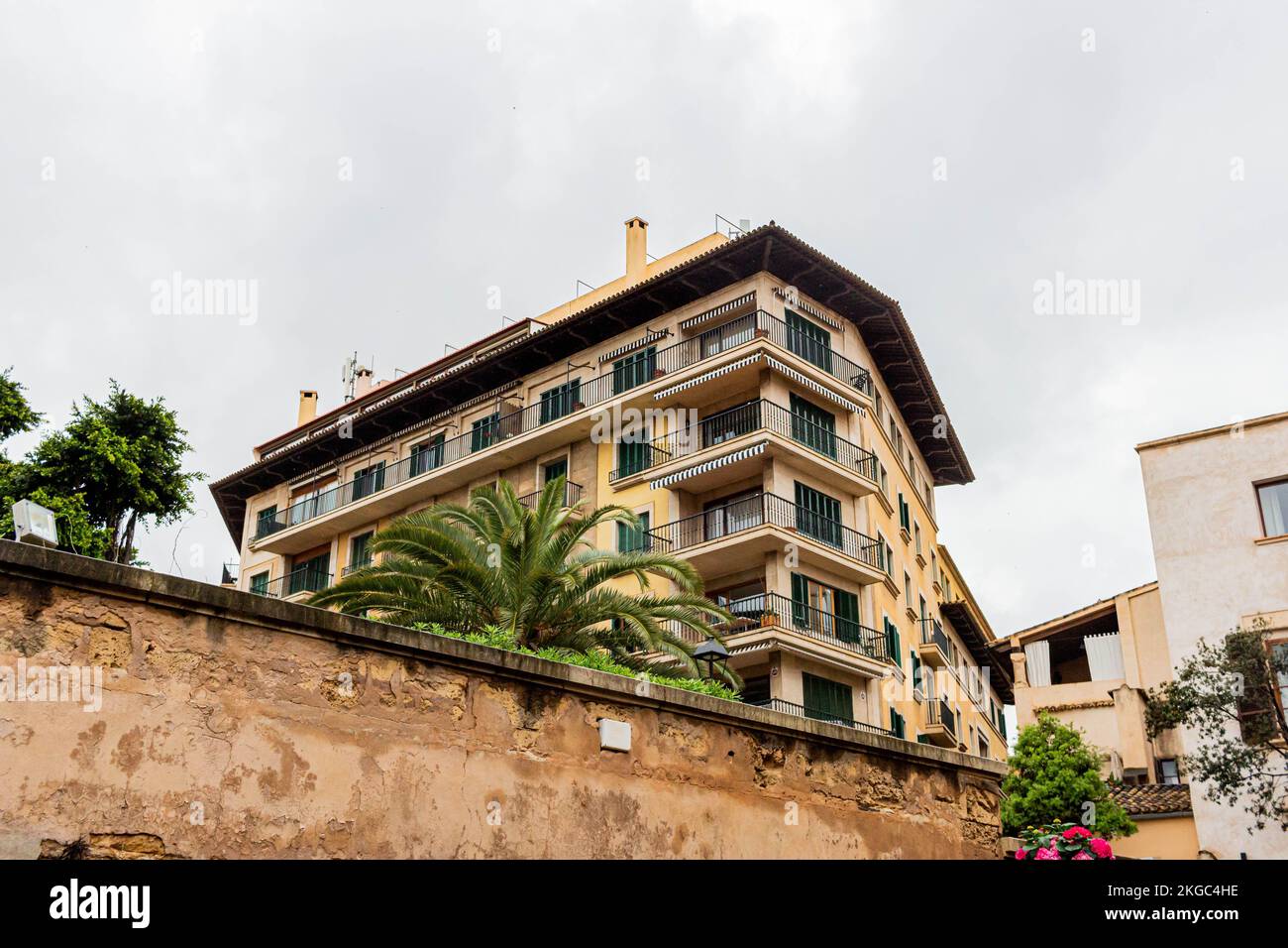 A low angle shot of a residential building in a tropical city with ...