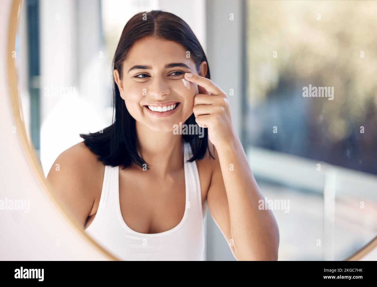 Beauty, cream and skincare woman in mirror for sunscreen, facial and ...