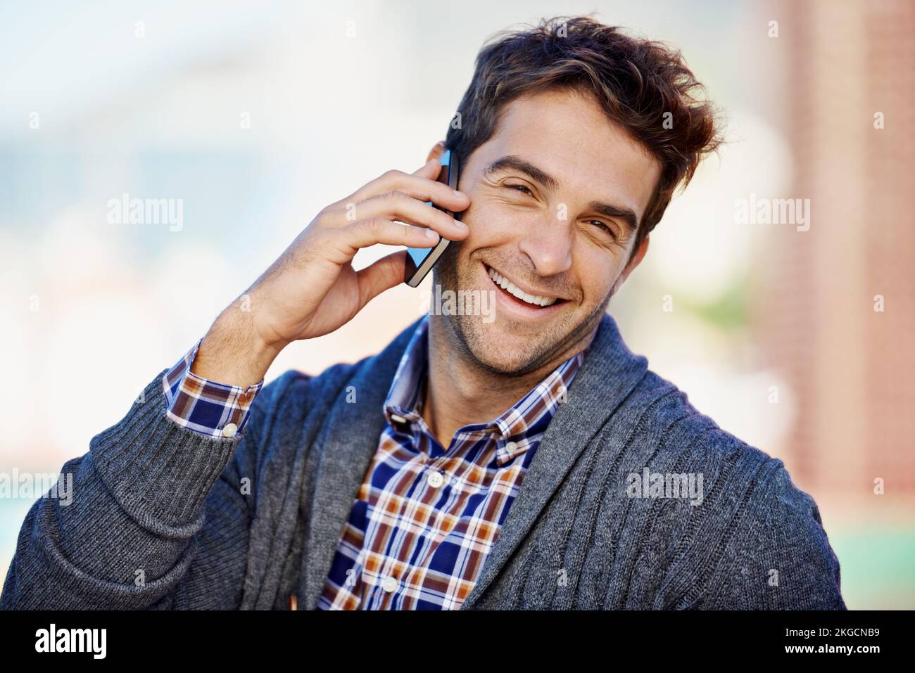 I love it when you call. a handsome young man making a call on his ...
