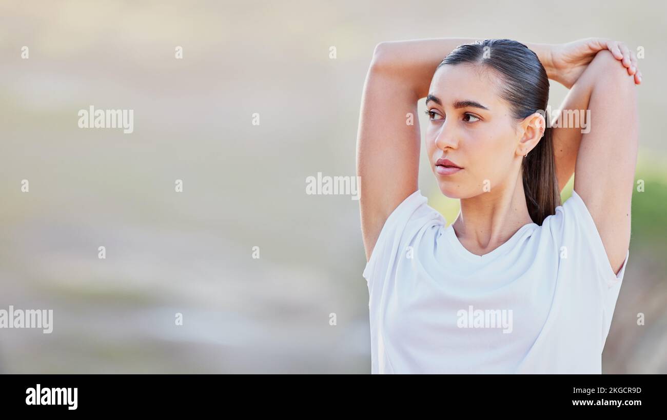 Stretching arms, woman and outdoor exercise for healthy cardio run ...