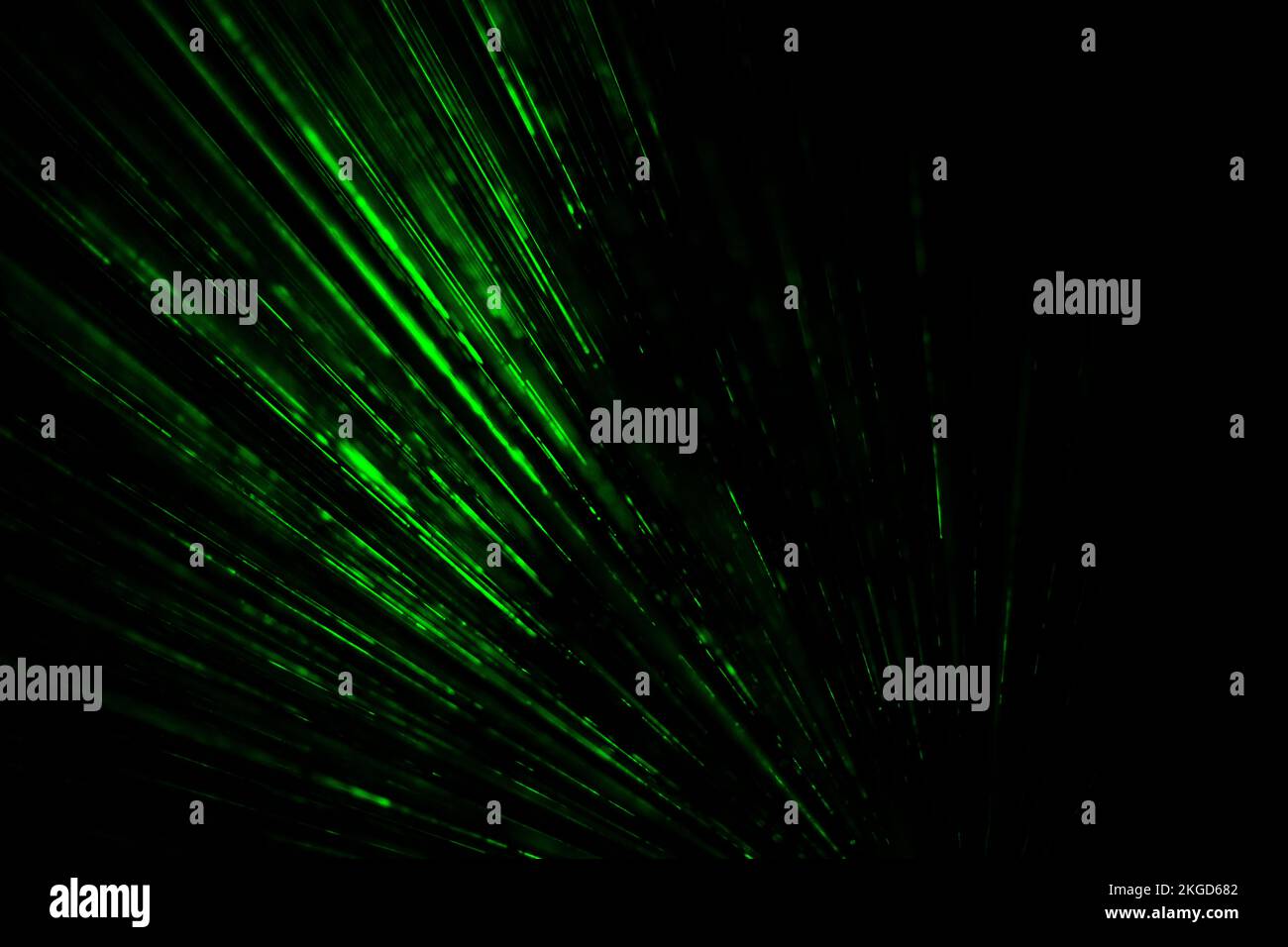 Laser beams in dark. Green rays on black background. Light music bright ...
