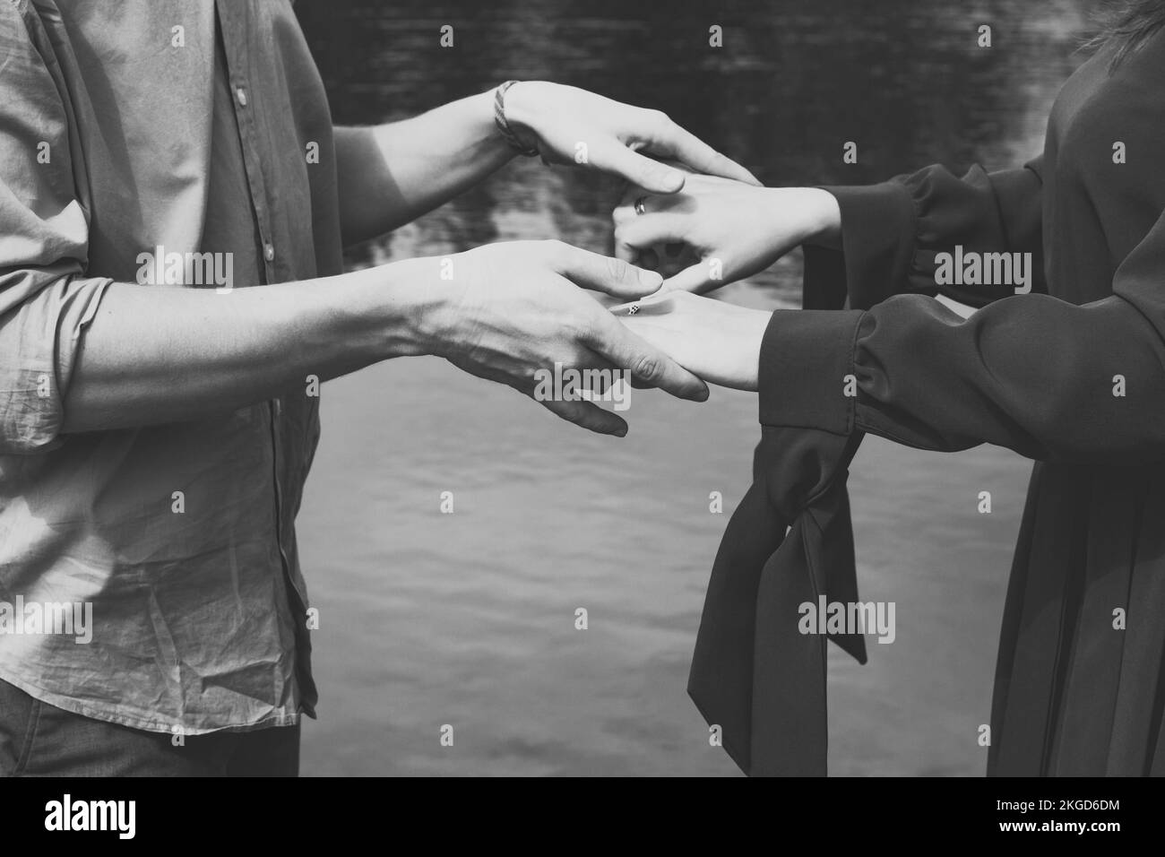 Concept photo hand holding Black and White Stock Photos & Images - Alamy