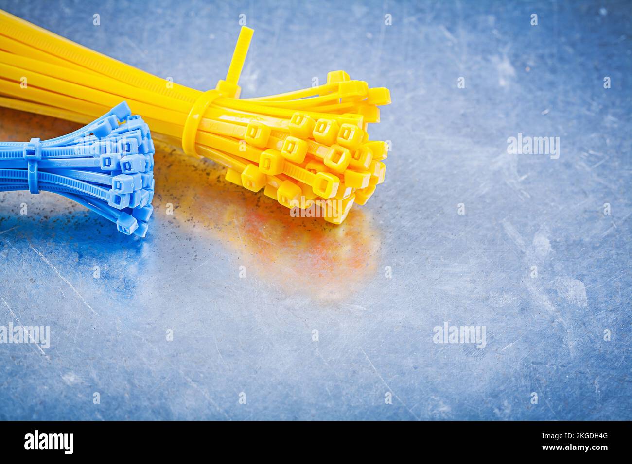 Bunch of tying cables on metallic background construction concept Stock ...