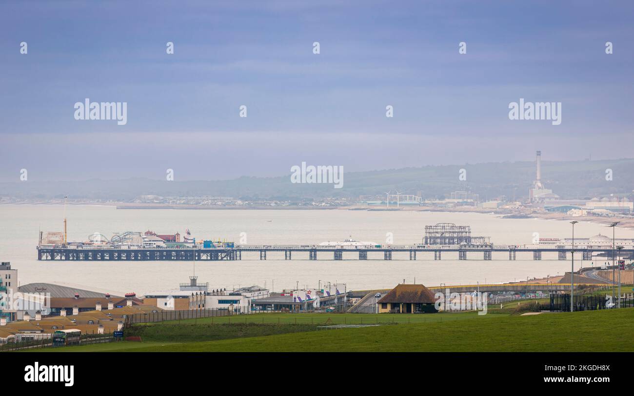 View west of Brighton city seafront and piers from Beacon Hill ...