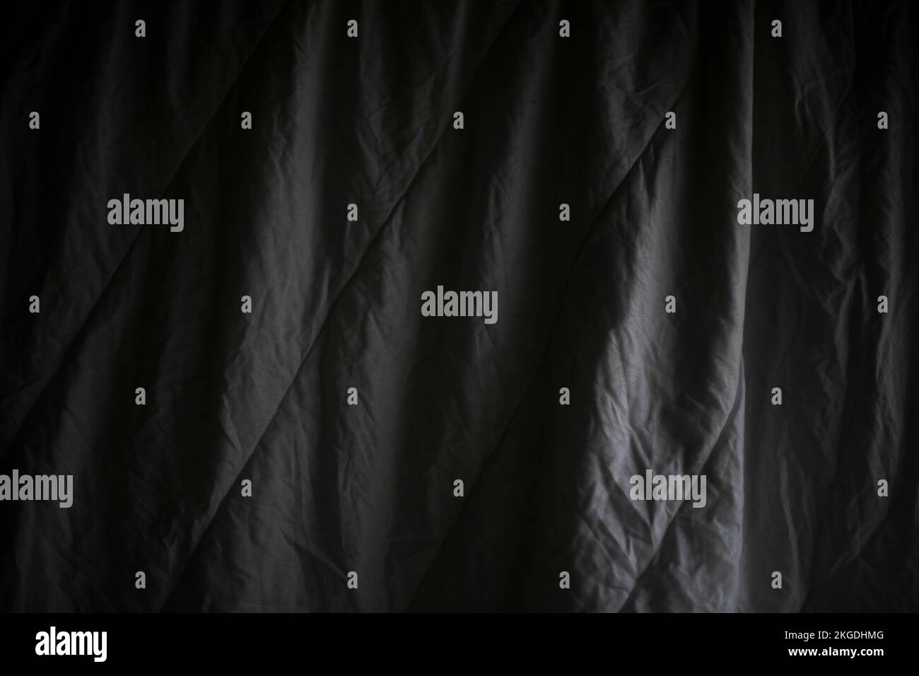 Blanket dries in room. Drying clothes. White linen. Fabric texture ...