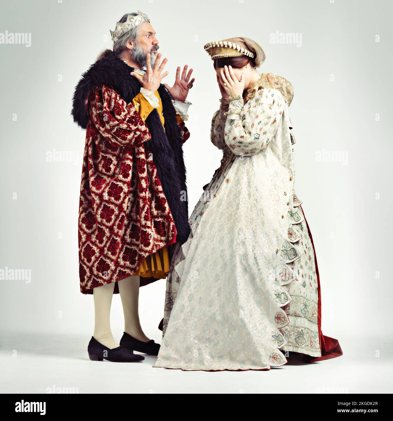 Even royals have problems. Studio shot of a king and queen arguing ...