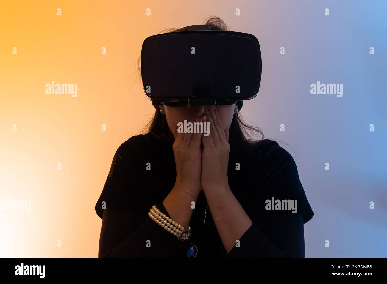 Teenage girls are having fun playing VR glasses virtual reality ...