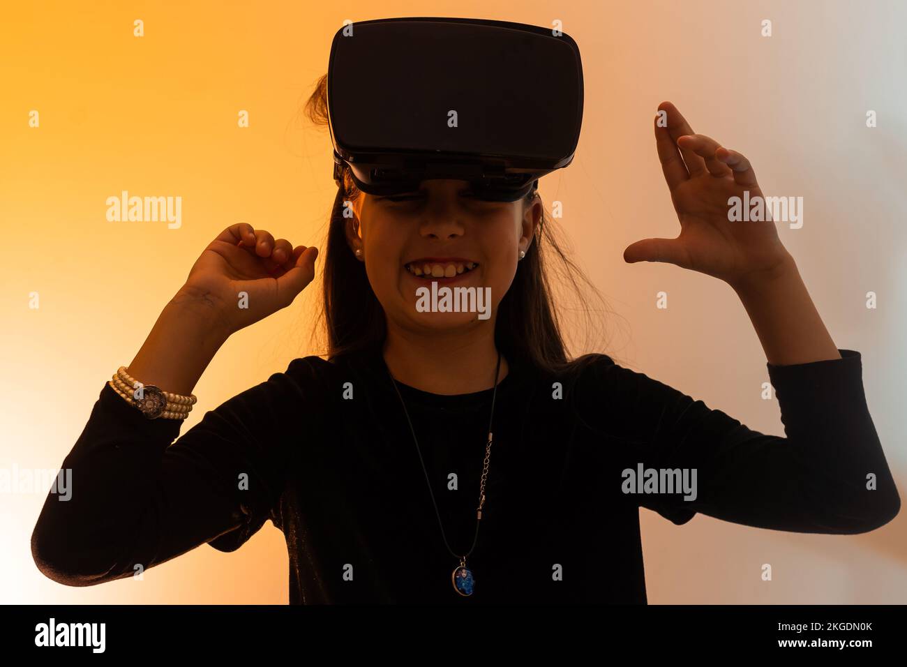 amazed teen girl wear vr glasses using technology for education in ...