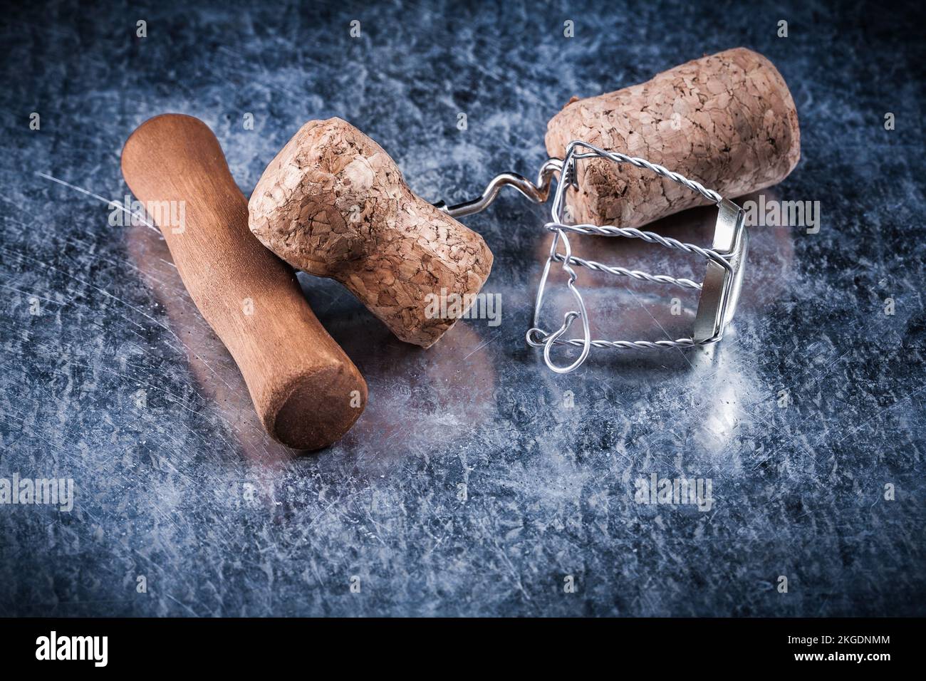 Collection of champagne corks twisted wire corkscrew on metallic ...