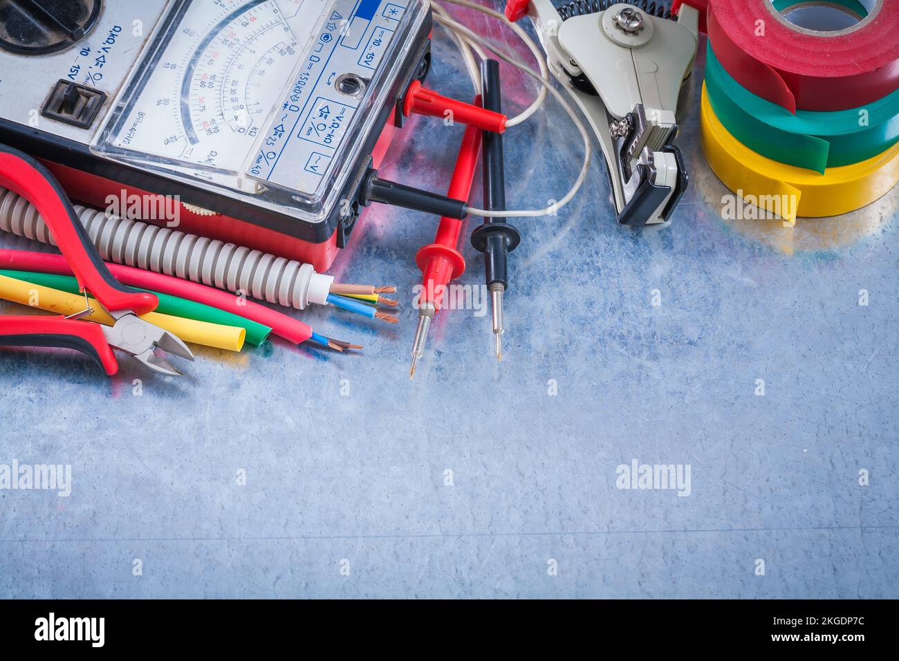 Collection of electrical articles on metallic surface close up view ...