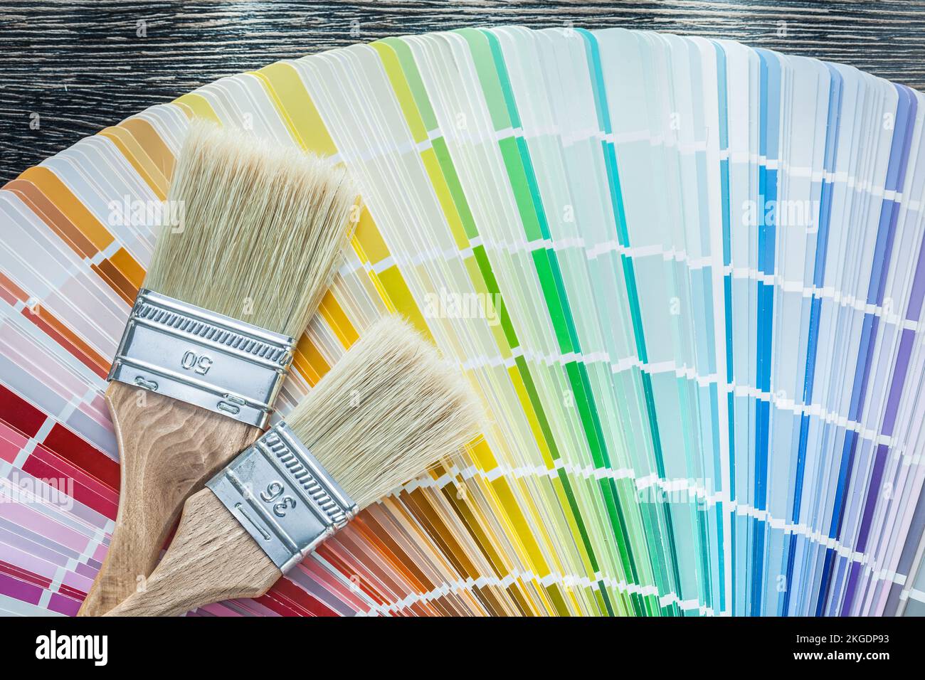 Color sampler paintbrushes on wooden board Stock Photo - Alamy