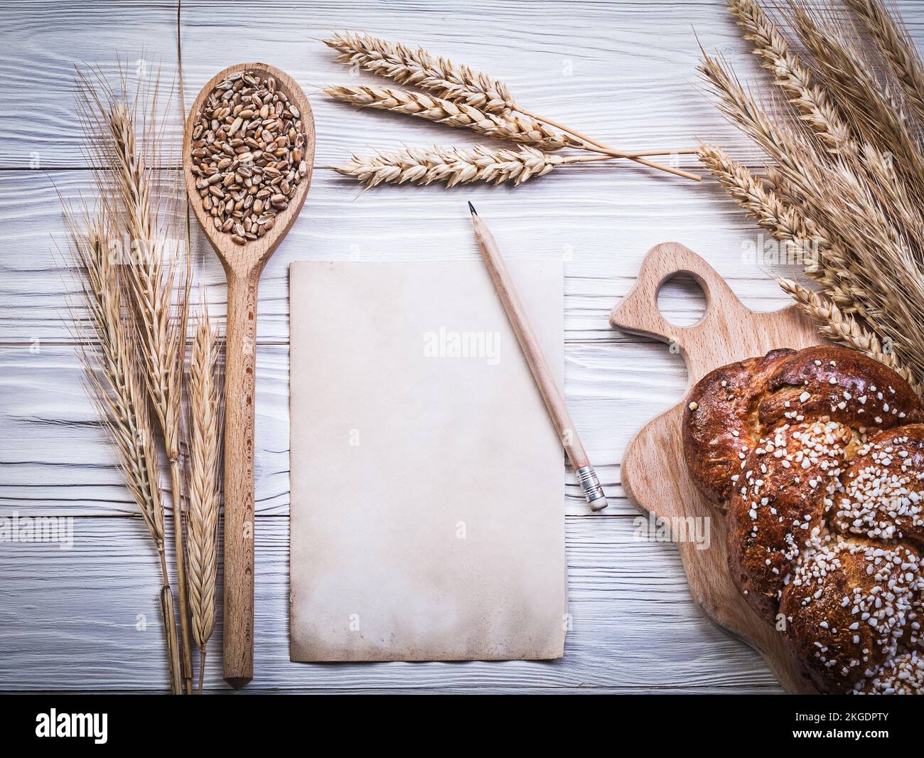 Composition of carving board wheat-rye ears baked bread stick wooden ...
