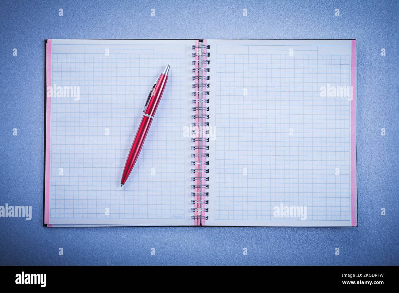 Composition of red ball-point pen open copybook office concept Stock ...