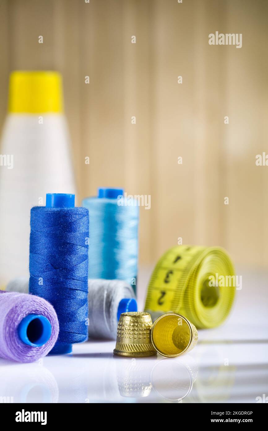 composition of spools and thimbles with measure tape Stock Photo - Alamy