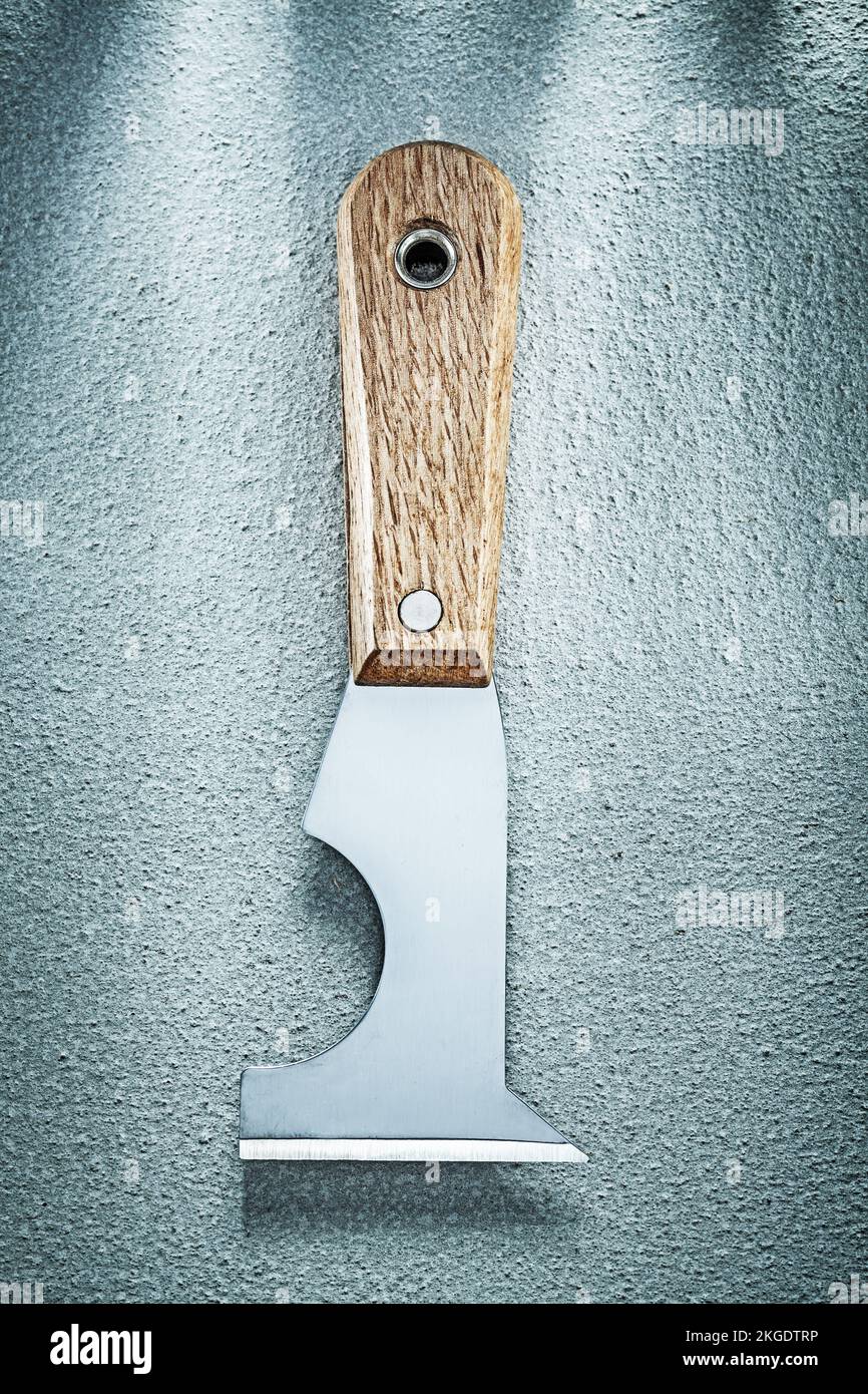 Construction spatula on concrete surface directly above building ...